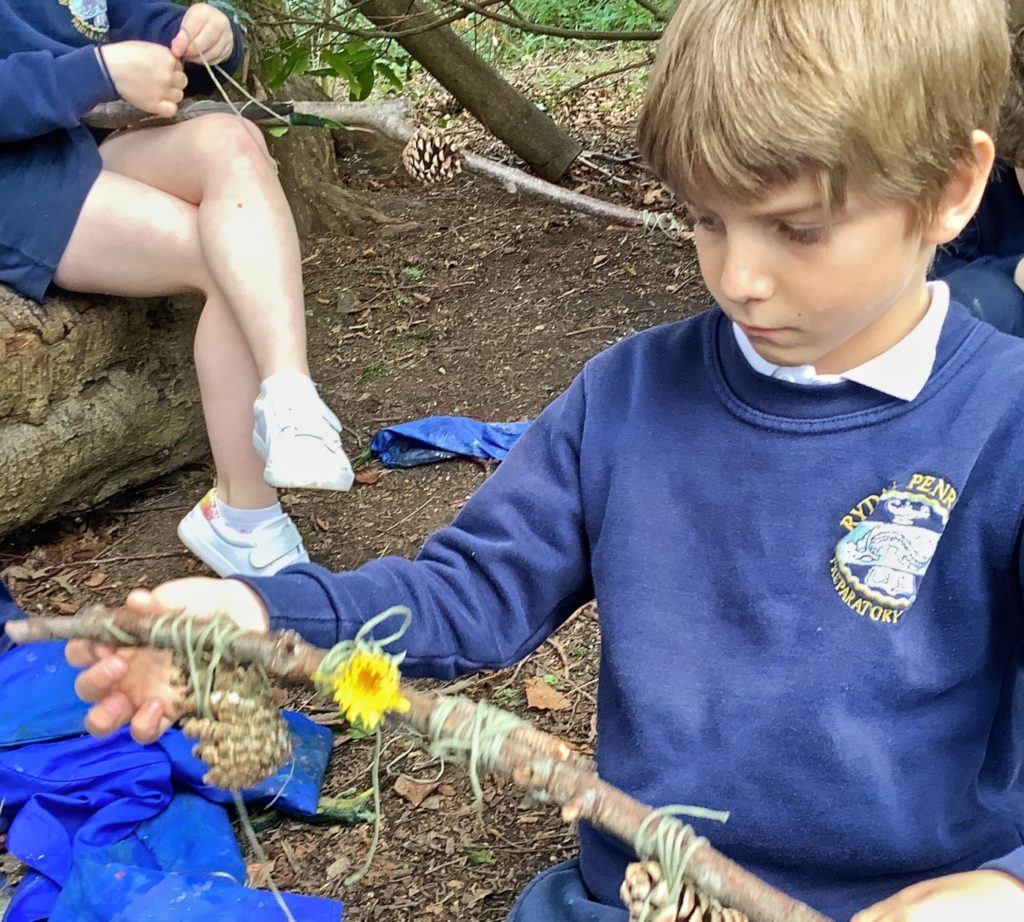 Year 2 use Forest School to create journey sticks - Rydal Penrhos